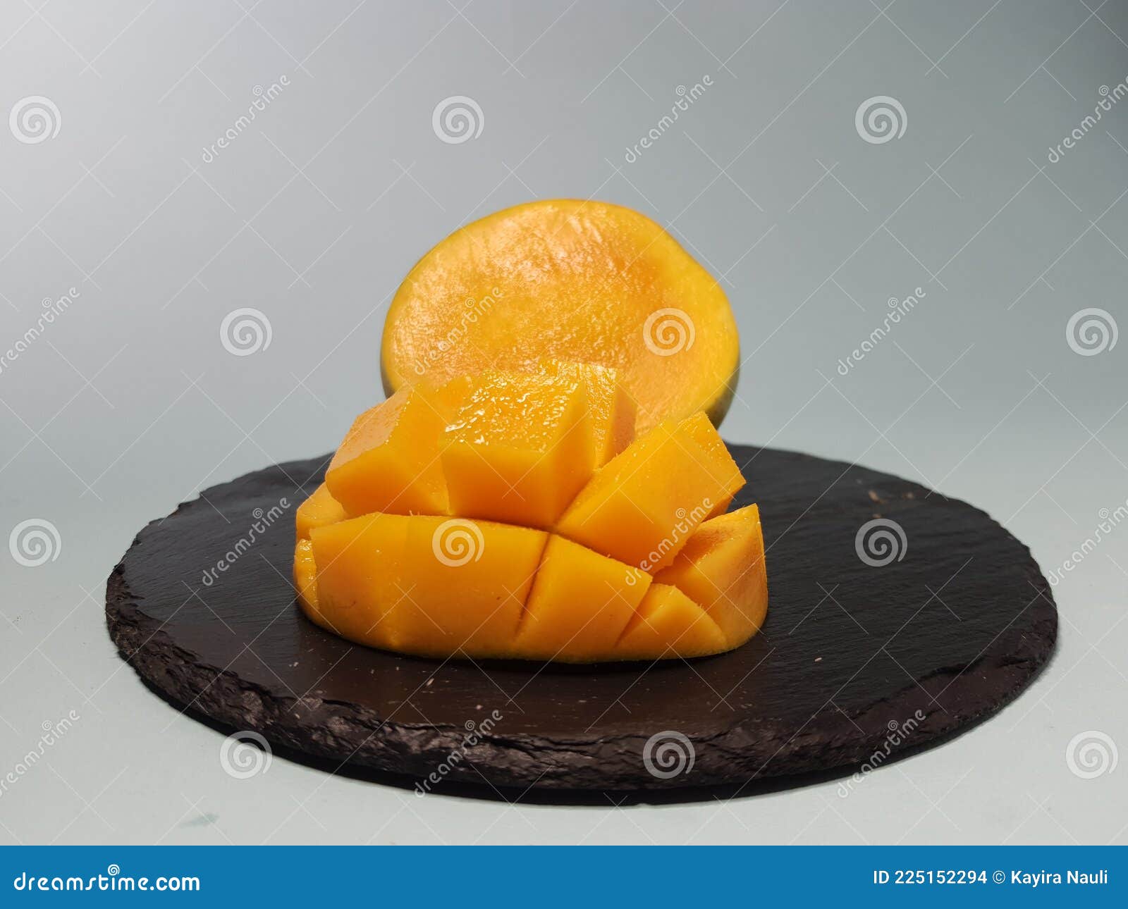 Mango Cut into Squares on Black Stone Stock Photo - Image of yellow ...