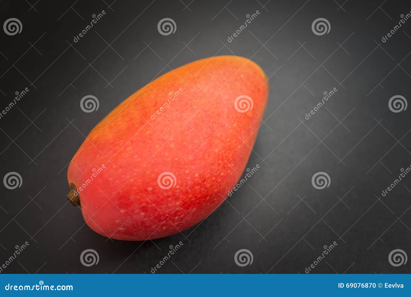 Mango on a dark. stock photo. Image of ripe, fruit, pile - 69076870