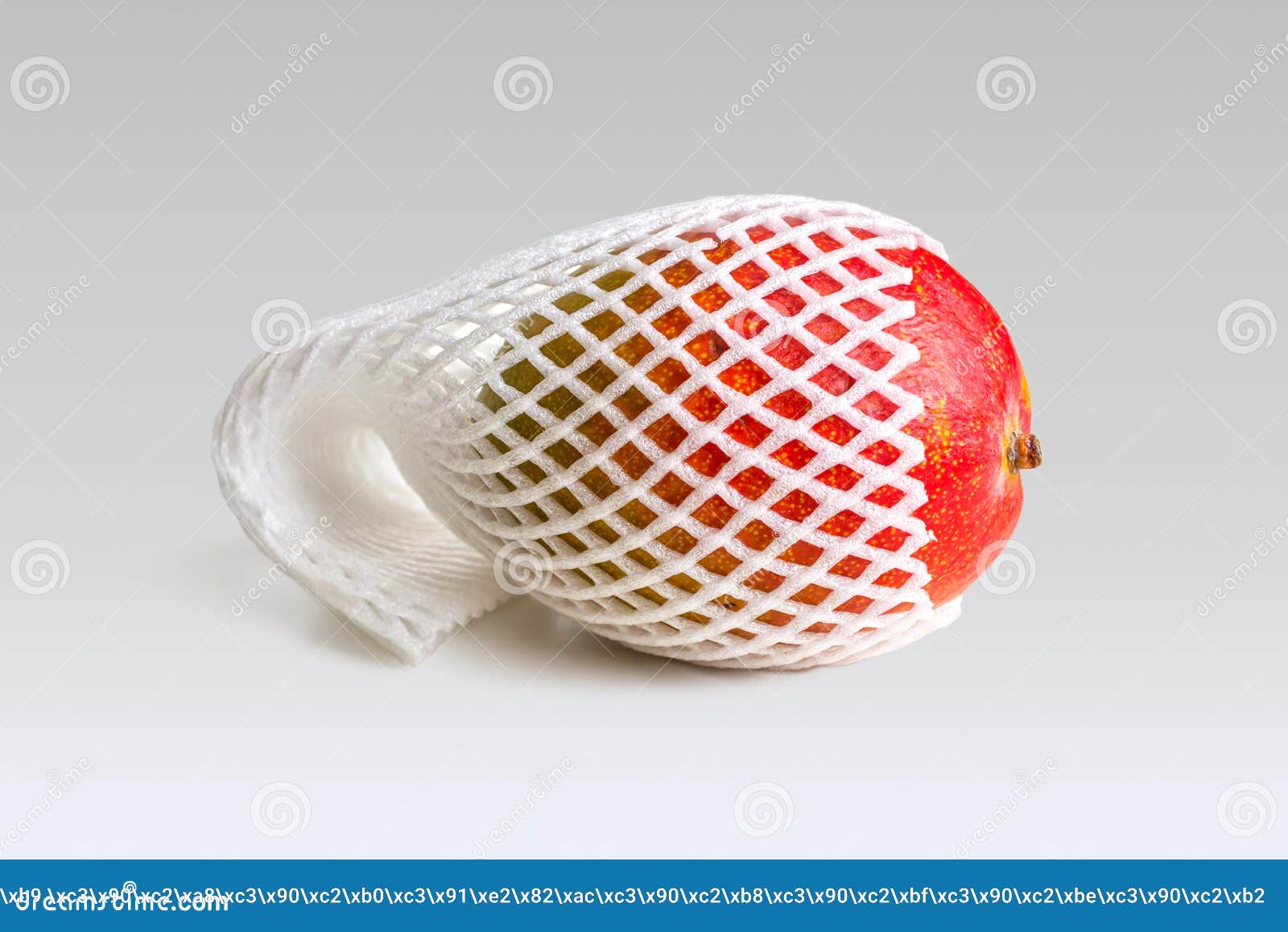 Mango Fruit in a Mesh Packaging Made of Food Foam for Fruit Stock Photo ...