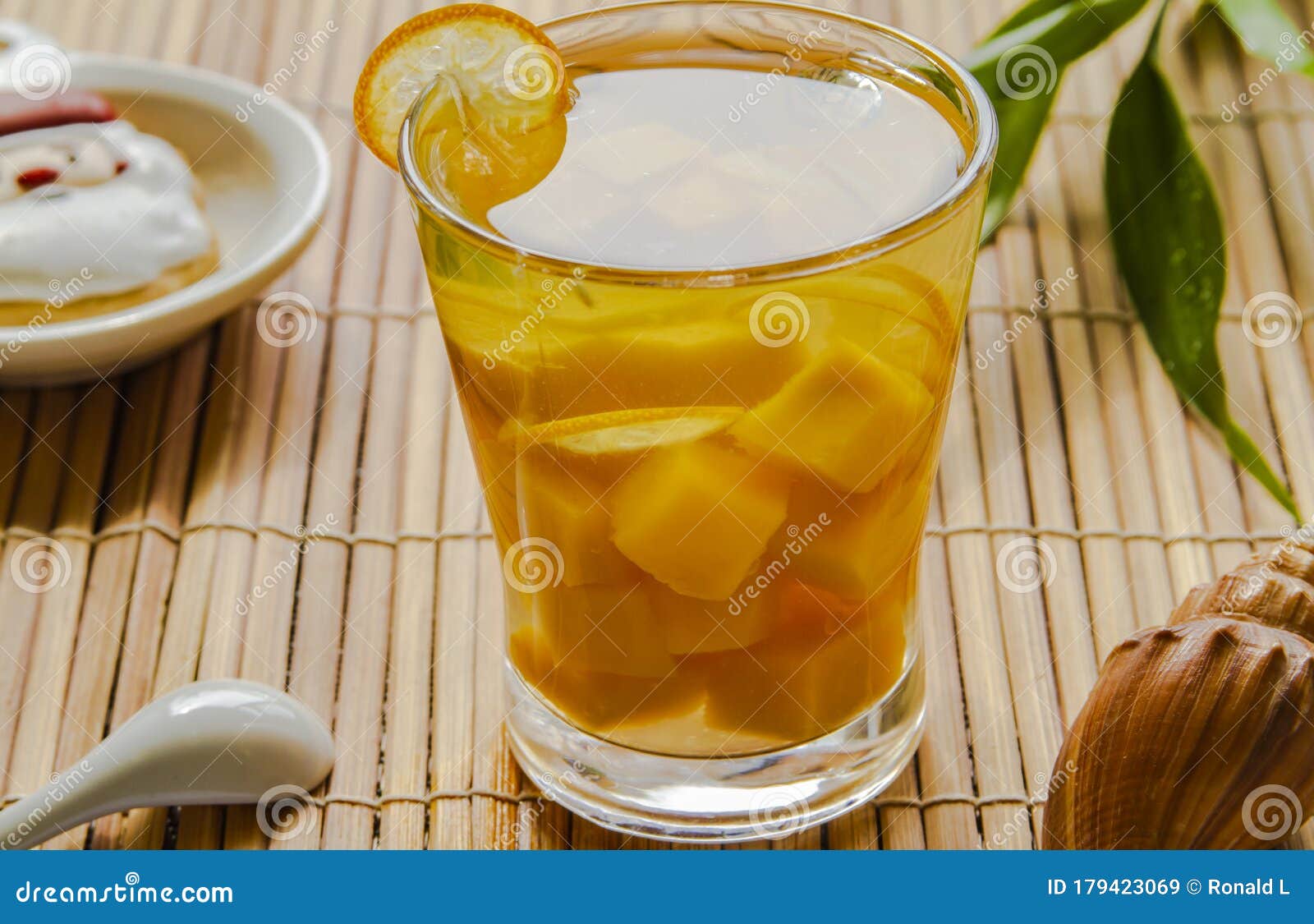 Mango fruit tea in a glass stock image. Image of flower - 179423069