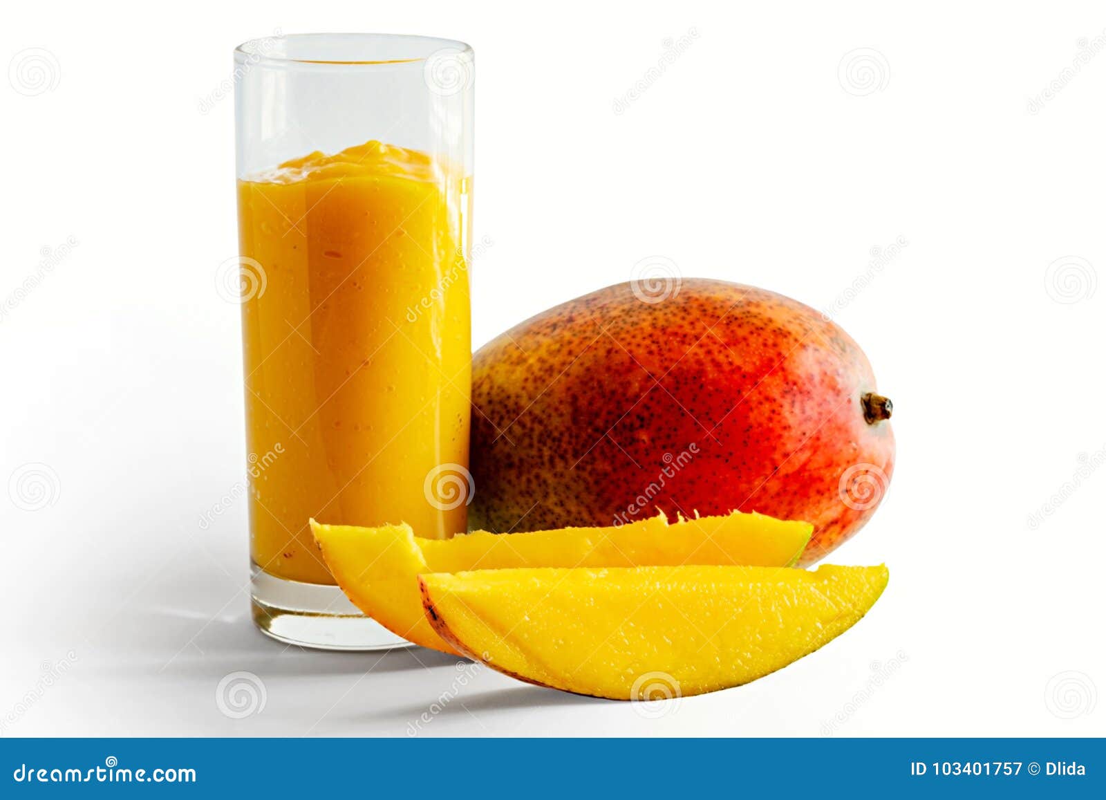Mango Juice in a Glass and Pieces of Mango Stock Image - Image of juice ...