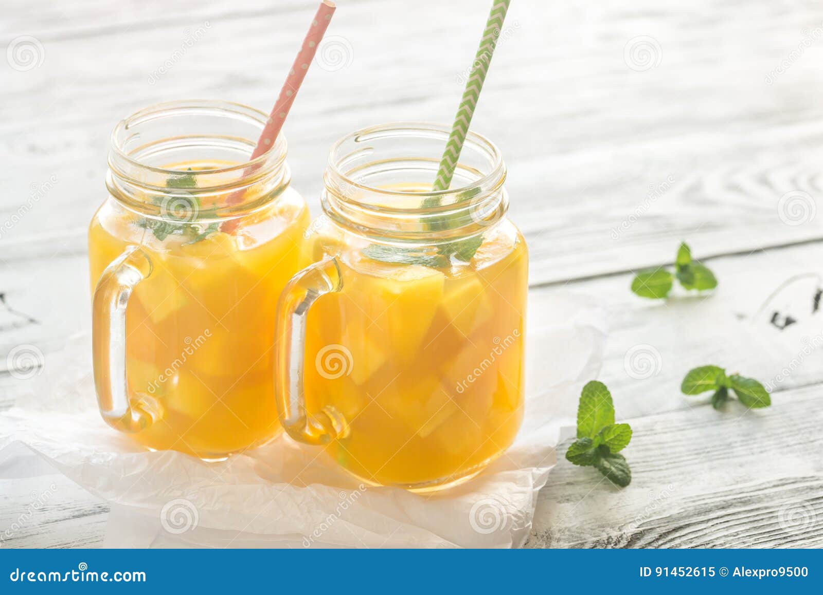 Mango juice in mason jars stock image. Image of juicy - 91452615