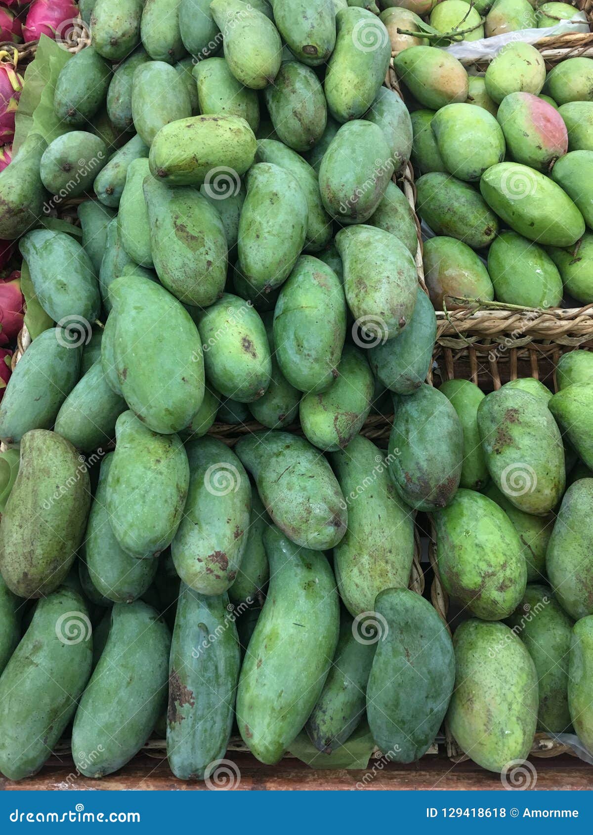 Mango pile in the fruit. stock photo. Image of america - 129418618