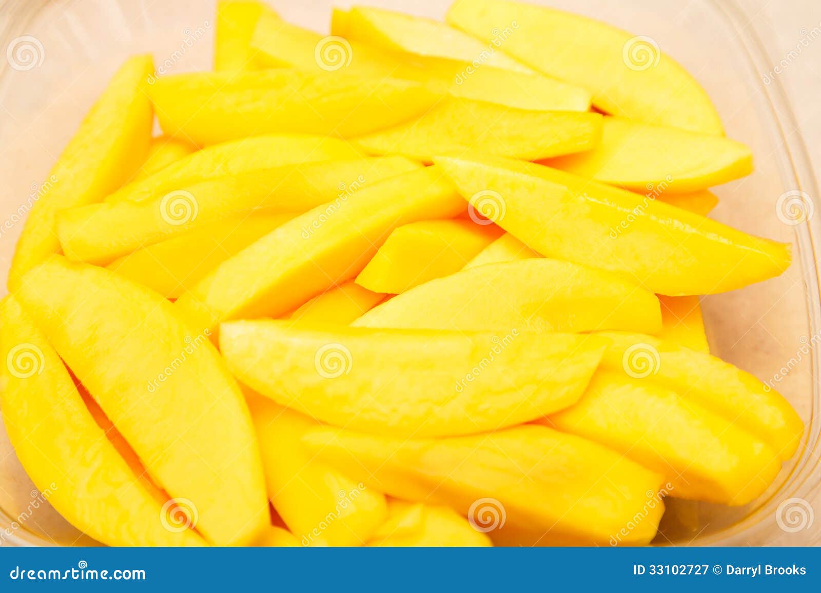 Mango Slices in Clear Bowl stock image. Image of exotic - 33102727
