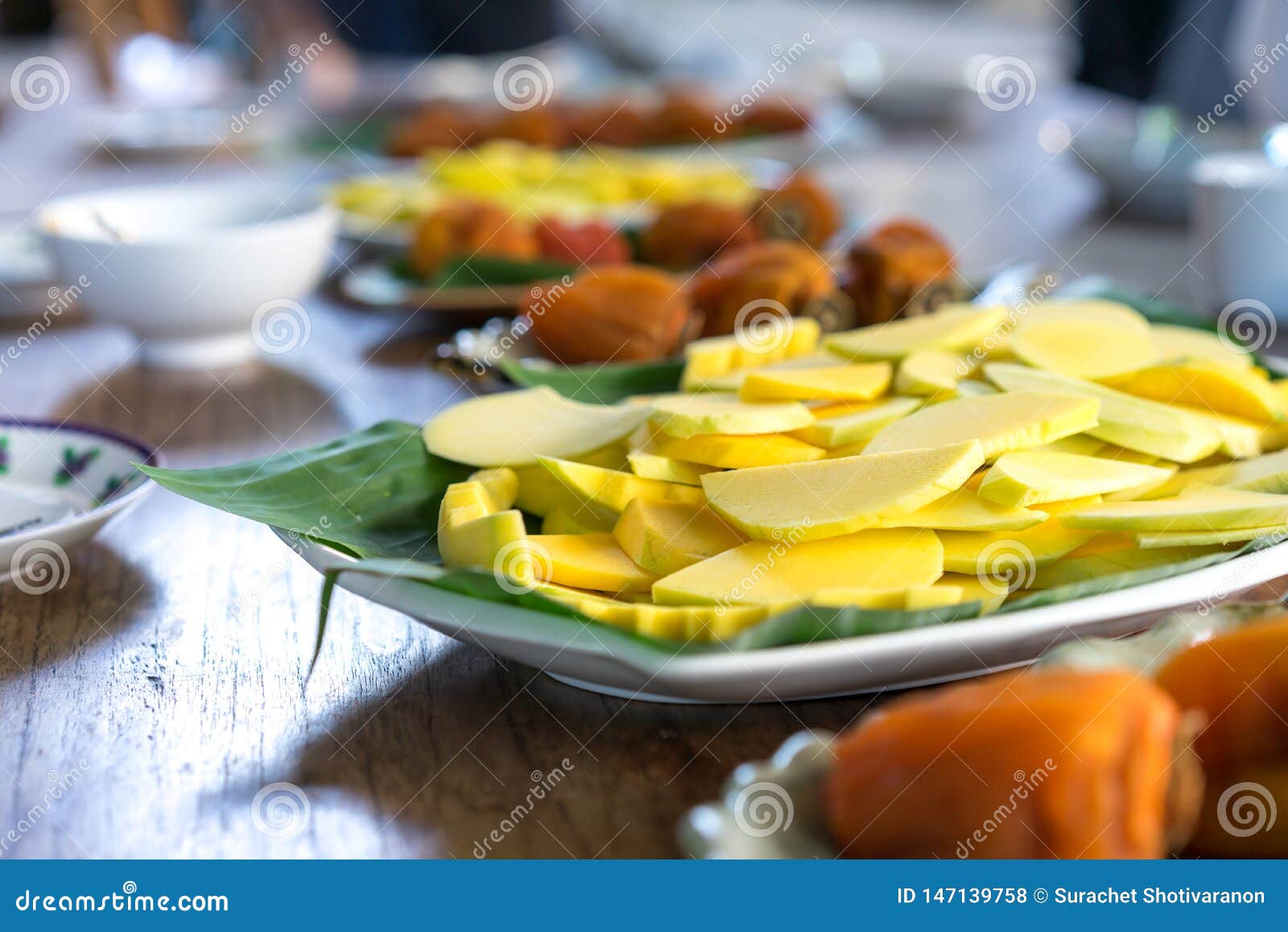 Mango Slide and Dried Persimmon Stock Photo - Image of orange, color ...