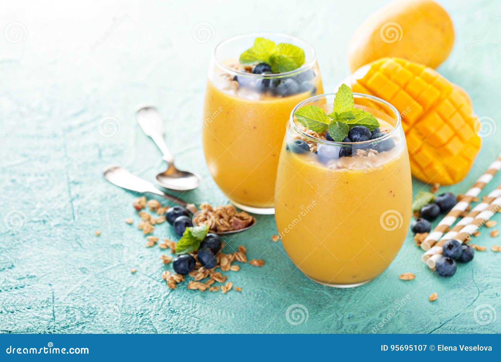 Mango smoothie in glasses stock image. Image of juice - 95695107