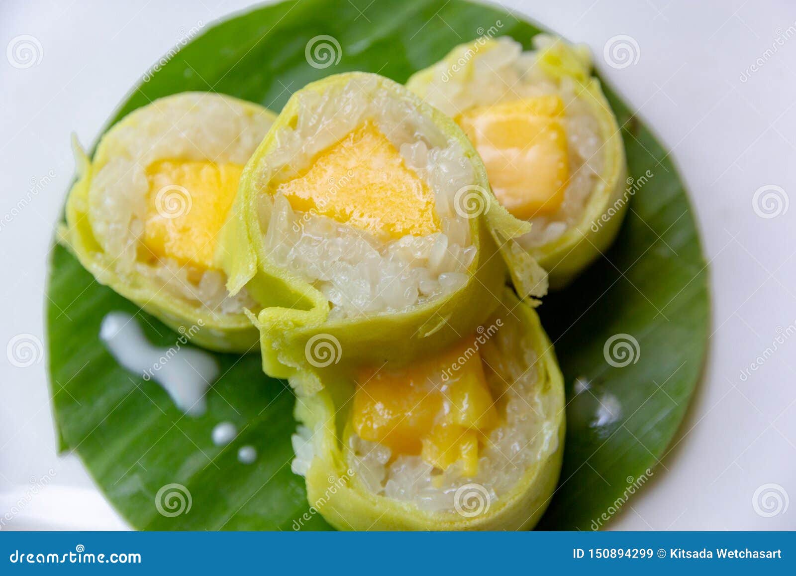 Mango Sticky Rice with Coconut Milk Roll on Banana Leaf Stock Image ...