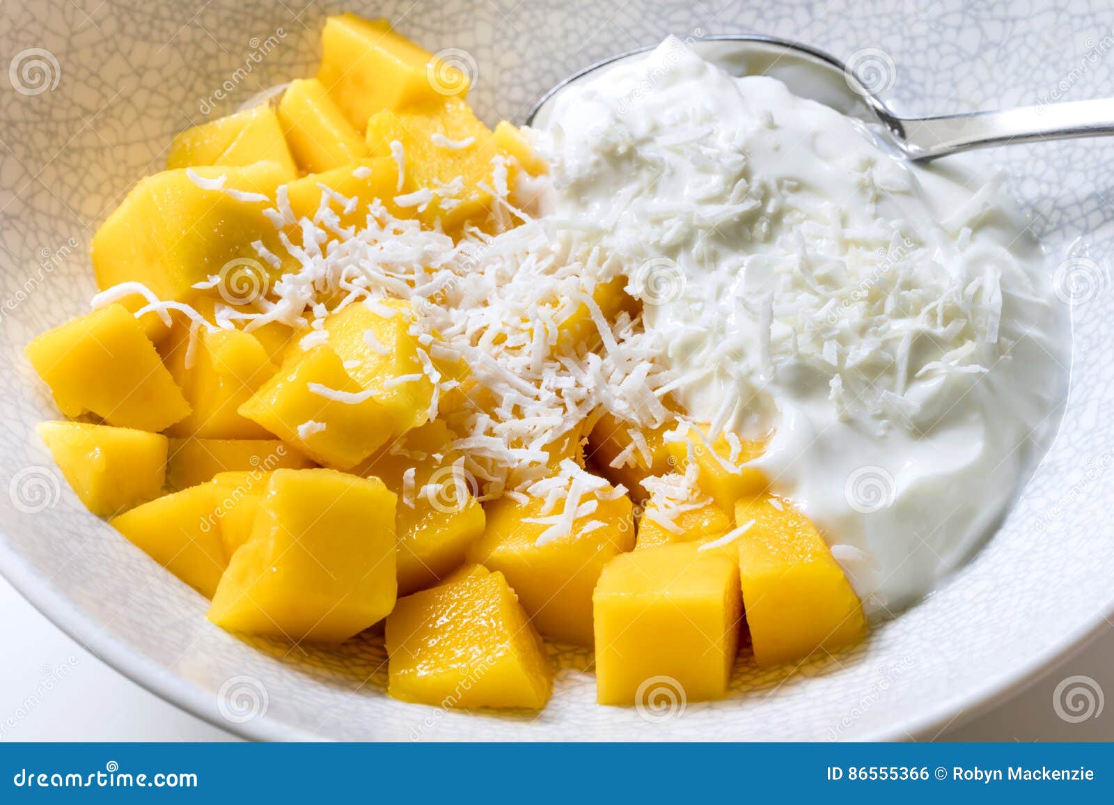 Mango with Yogurt and Shredded Coconut Stock Photo - Image of shredded ...