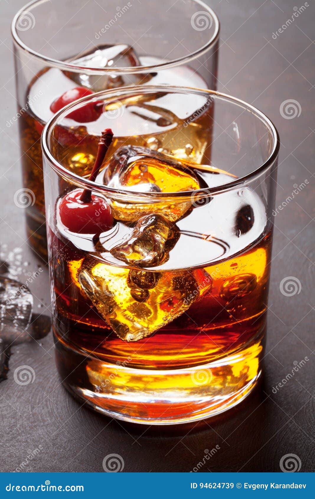 Manhattan cocktail glasses stock image. Image of mixed - 94624739