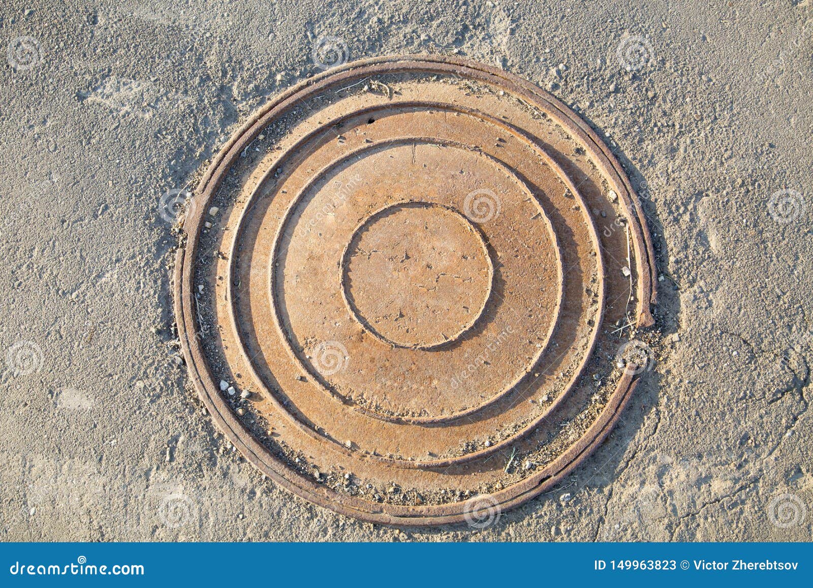 Manhole Cast Iron Heavy Brown with a Pattern of Several Rings Stock ...