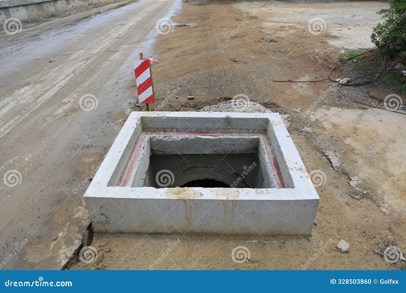 Manhole Cover on Concrete Road in Progress Stock Photo - Image of ...