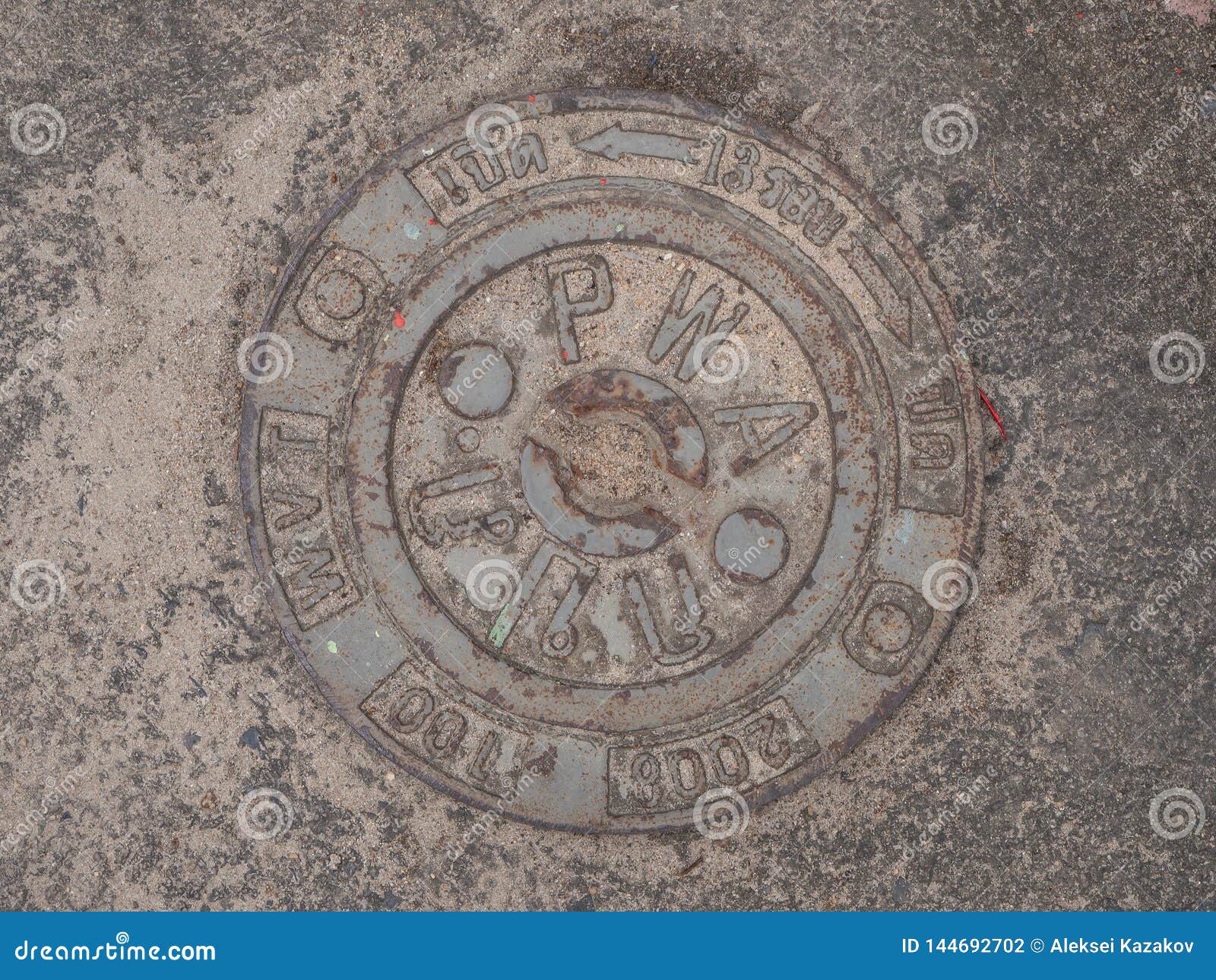 Manhole Cover on Pavement with Patterns Editorial Photography - Image ...