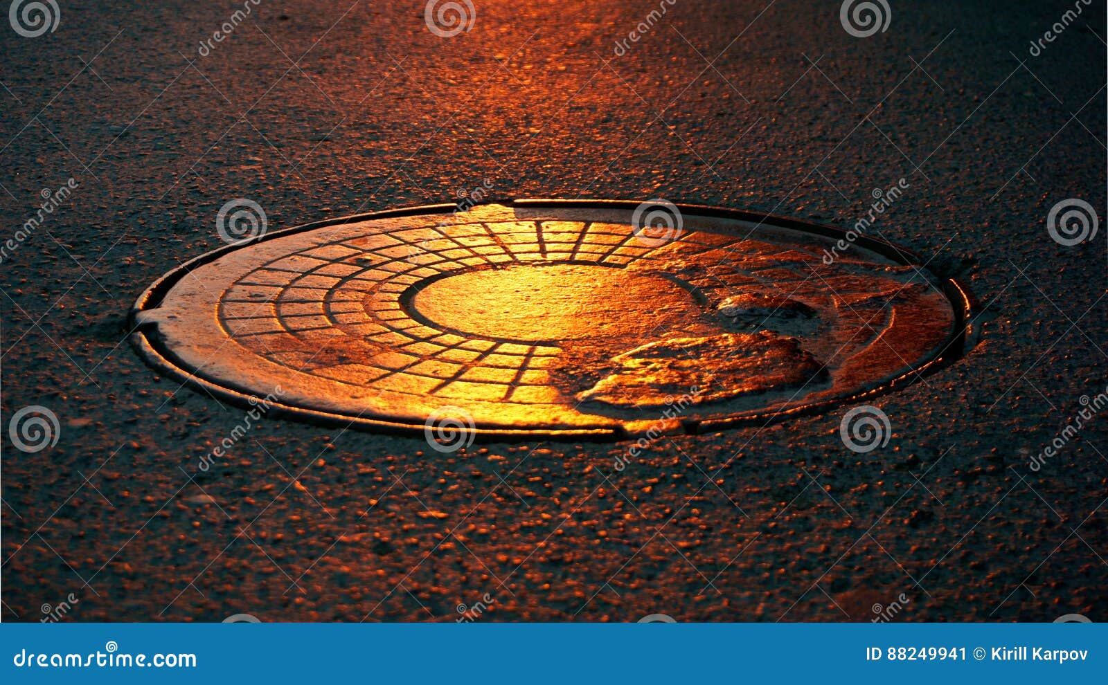 Manhole Cover in the Sunset Stock Image - Image of yellow, burning ...