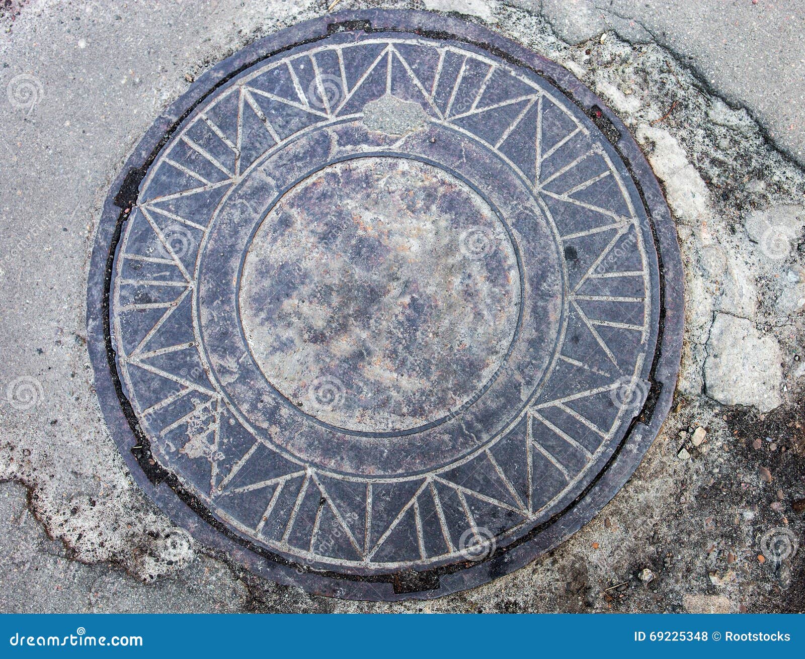 Manhole with Metal Cover in the Cracked Asphalt Surface Stock Photo ...