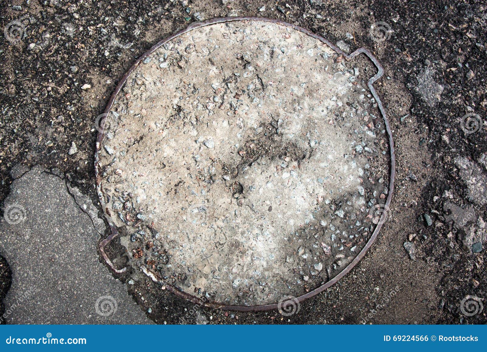 Manhole with the Metal Cover Surface Paved with Asphalt Stock Photo ...