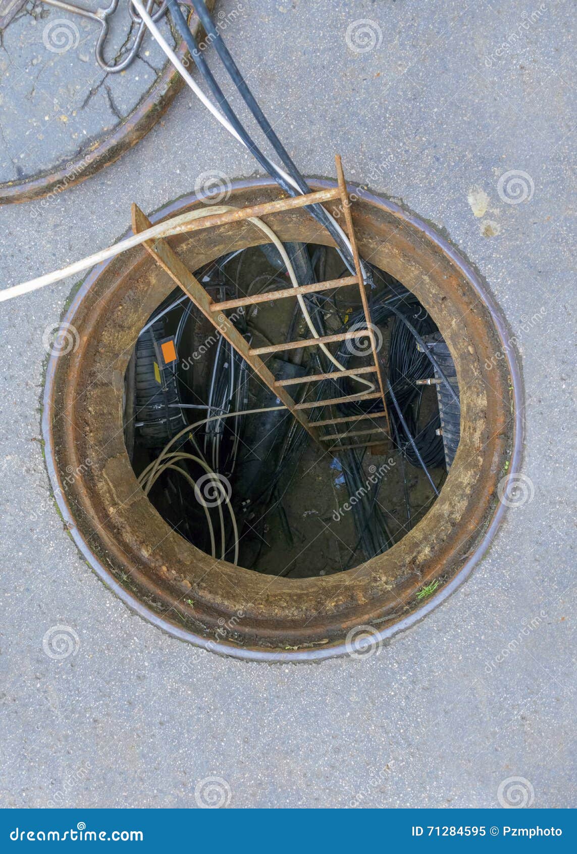 Manhole stock image. Image of sewer, communication, cables - 71284595