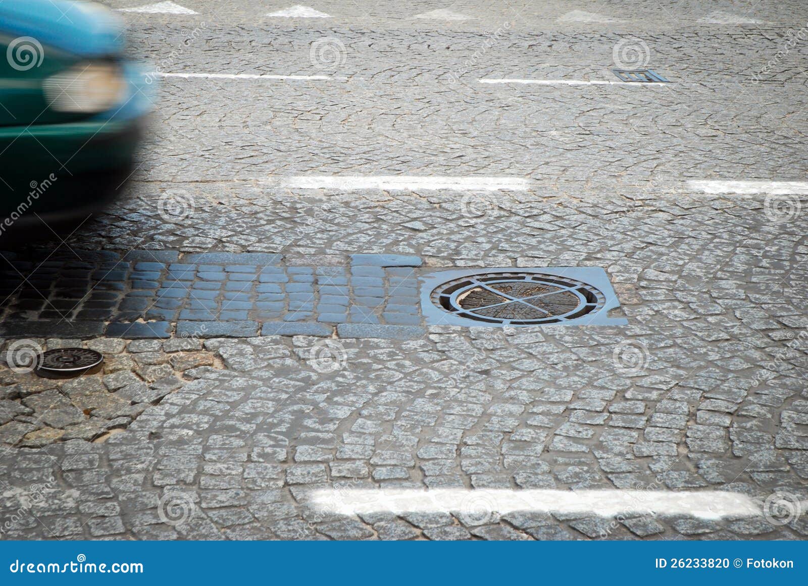 Manhole on the road stock photo. Image of sewer, iron - 26233820