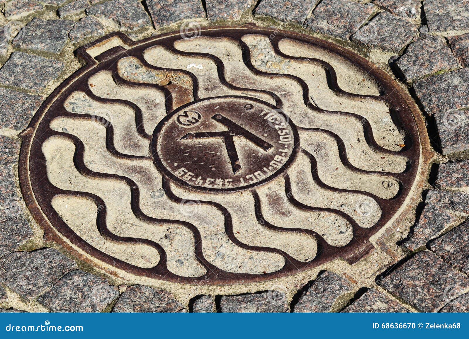 Manhole on a Street Pavement Stock Photo - Image of pavement, plums ...