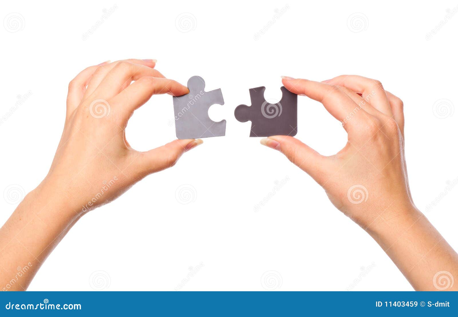 Mani con due puzzle immagine stock. Immagine di assistenza - 11403459