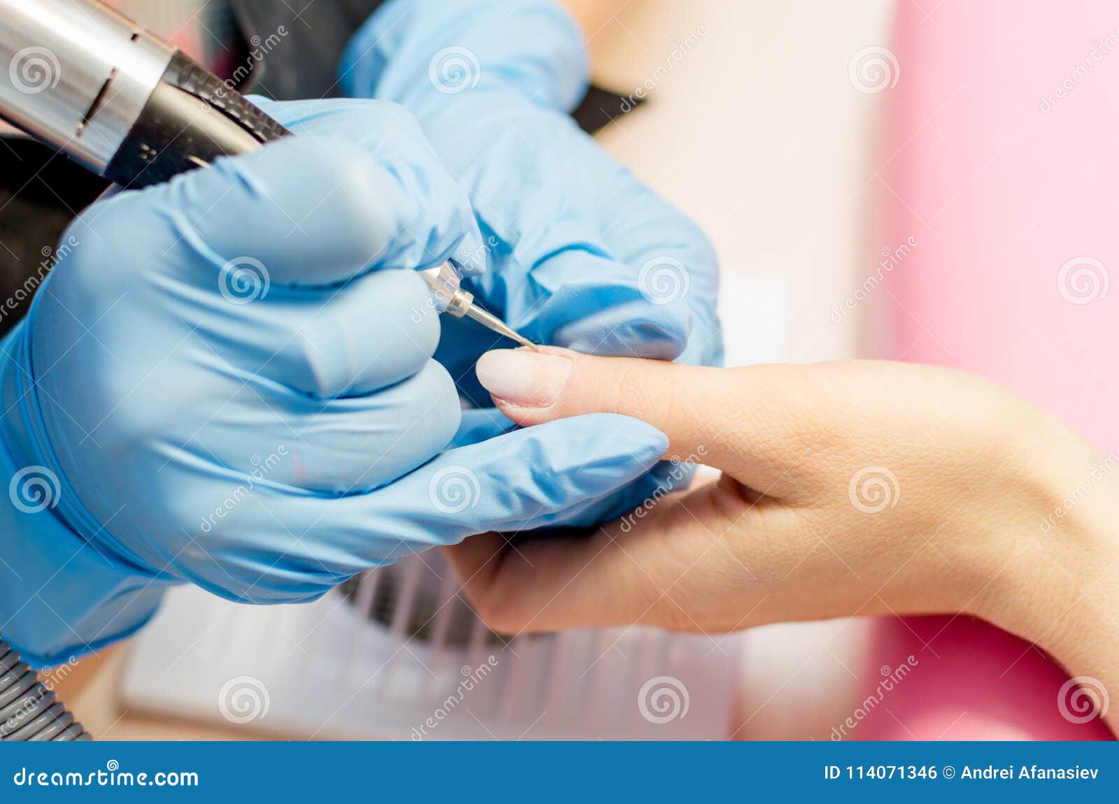 Manicure Process, Cleaning of Nails by a Milling Cutter Stock Photo ...