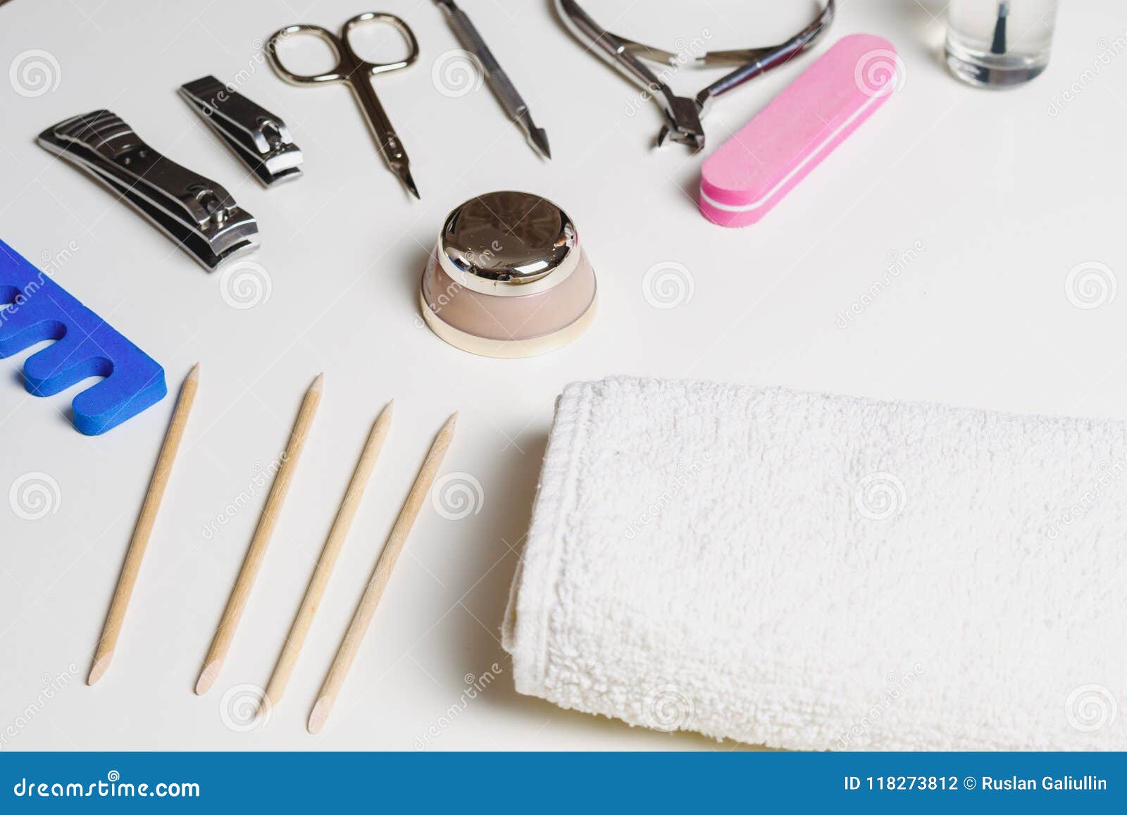 Manicure Tool Set with Towel on White Table Stock Photo - Image of ...