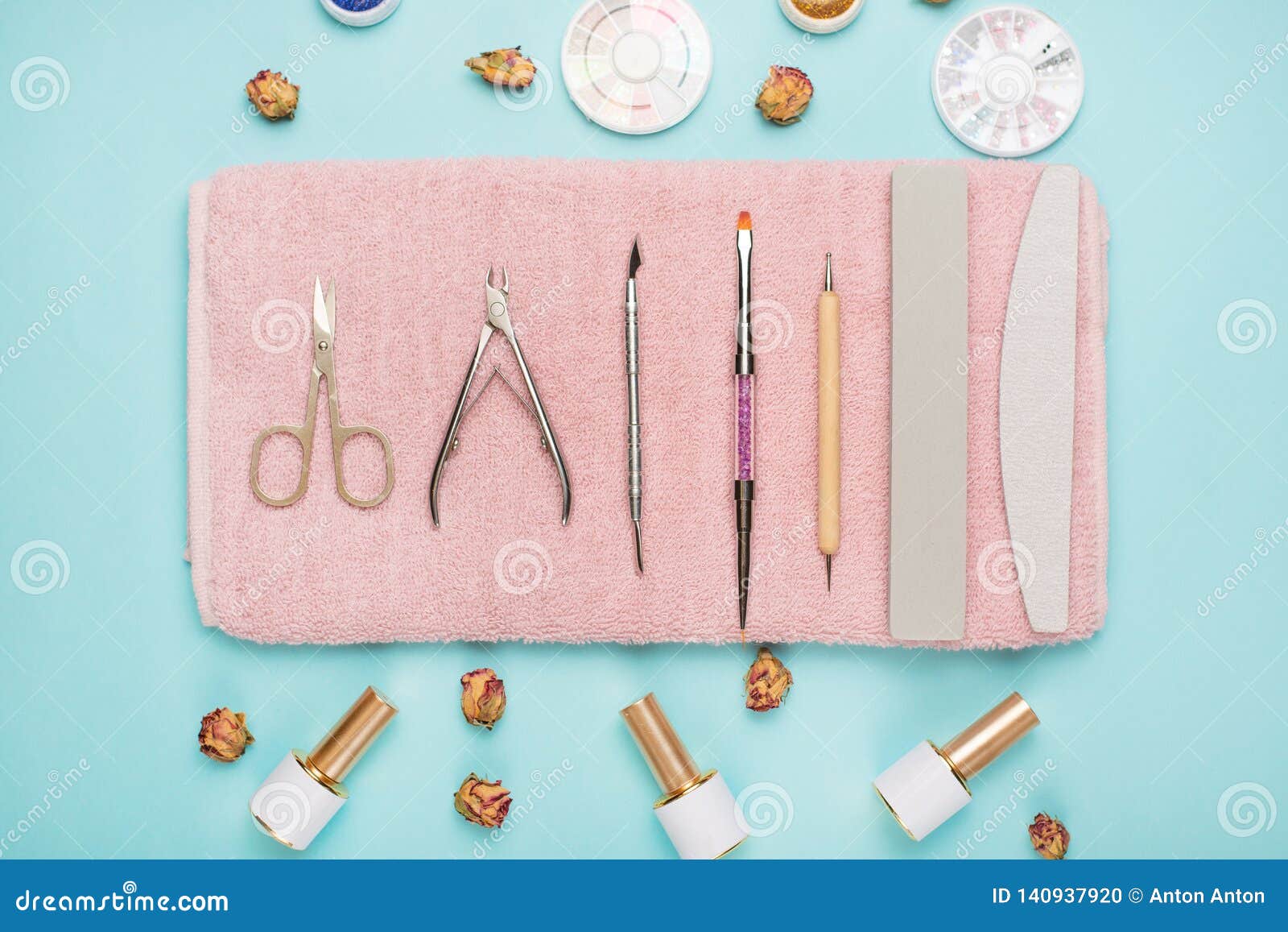 Manicure Tools on a Pink Towel and a Blue Background. Manicure ...