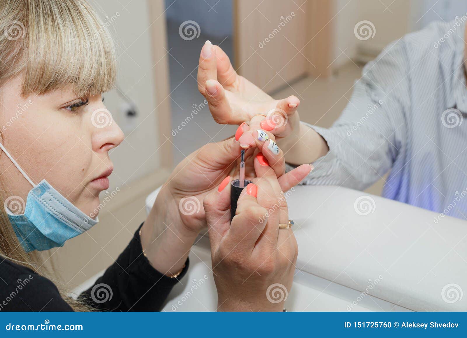 Manicuring Nails - Application of Base Coat. Nail Master Stock Photo ...