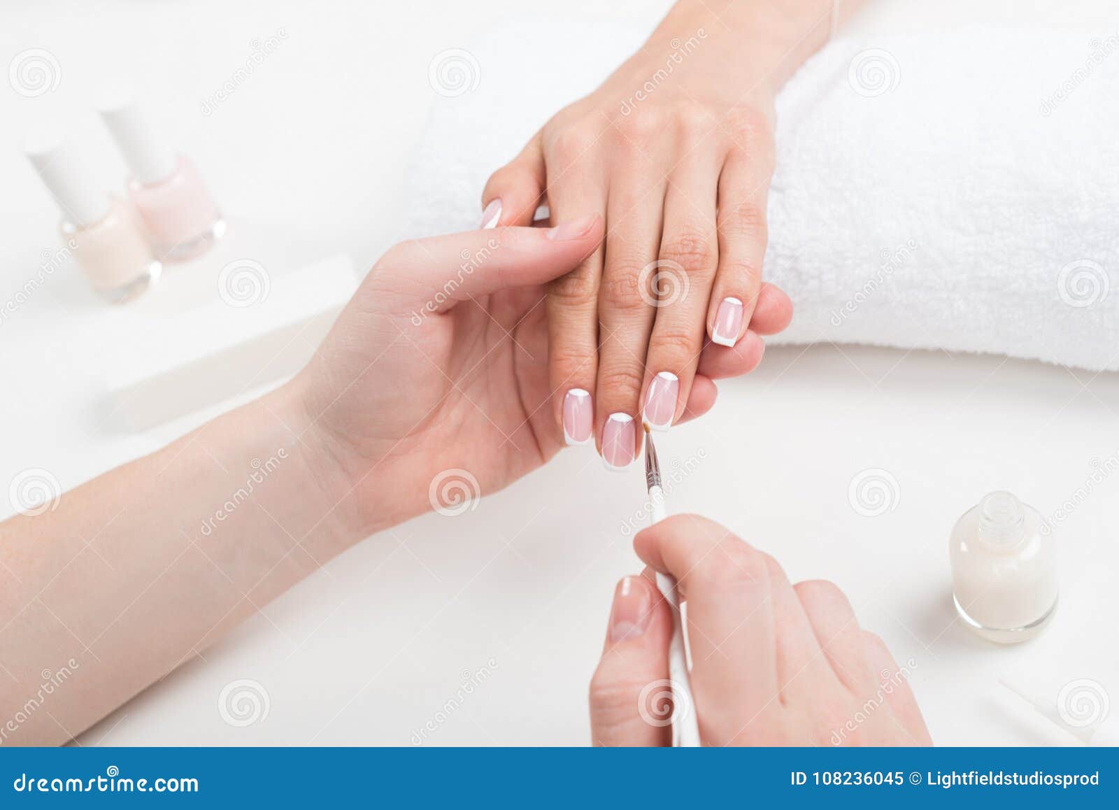 Manicurist Doing Manicure To Young Woman in Beauty Salon Stock Image ... Manicurist Doing Manicure To Young Woman in Beauty Salon Stock Image ...