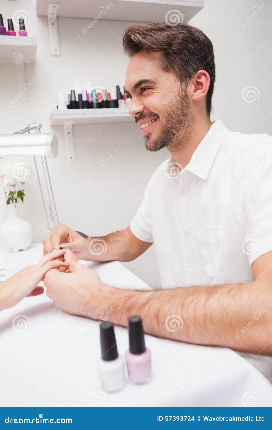Manicurist Giving Customer a Manicure Stock Photo - Image of people ...