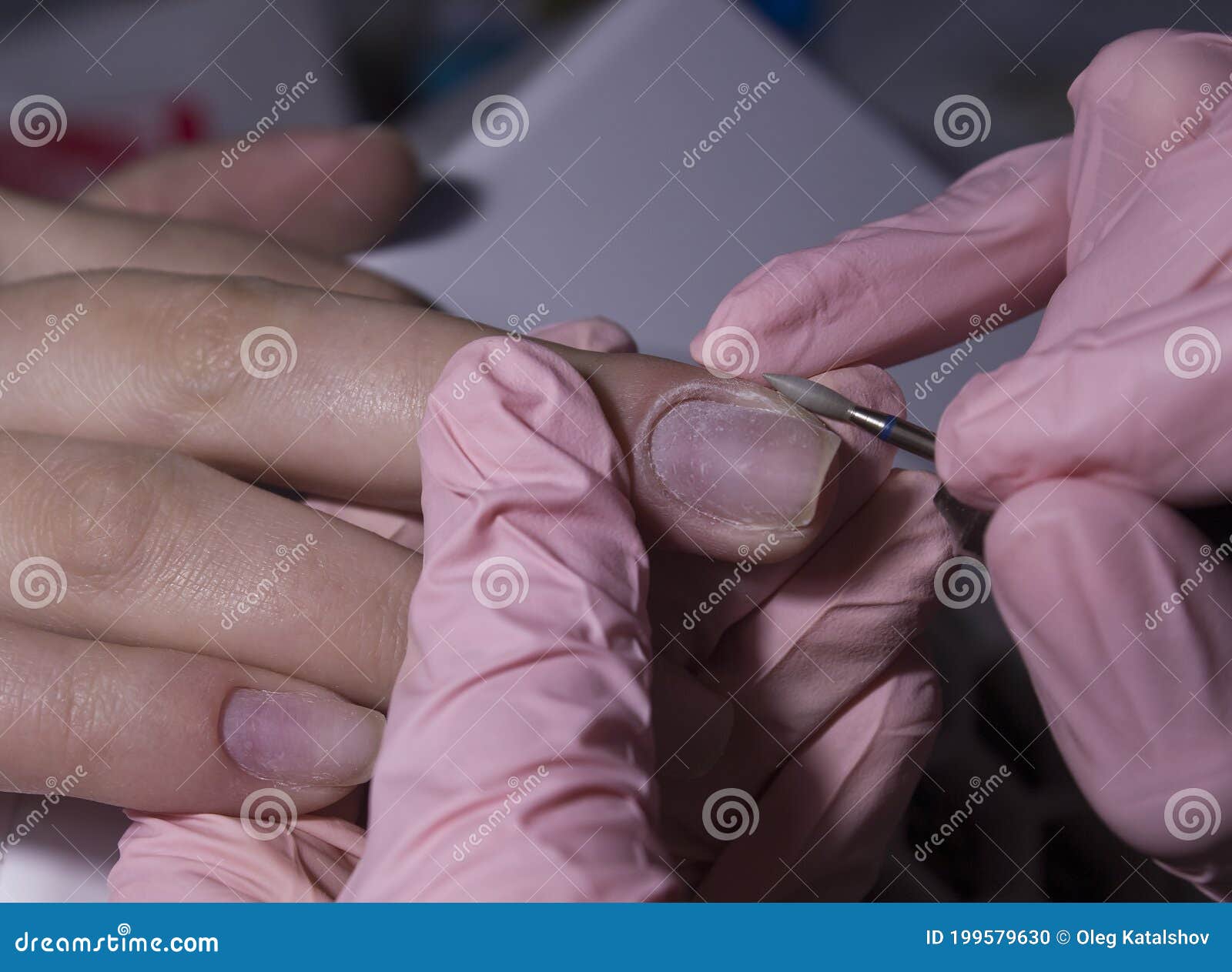 The Manicurist Processes the Client`s Cuticle with a Hardware Machine ...