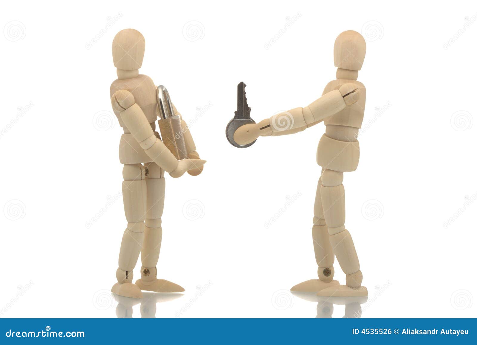 Manikins with lock and key stock photo. Image of clue - 4535526