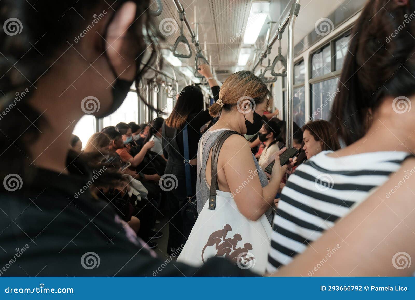 Manila, Philippines: Filipino Commuters Inside a Cabin in a Moving LRT ... Manila, Philippines: Filipino Commuters Inside a Cabin in a Moving LRT ...