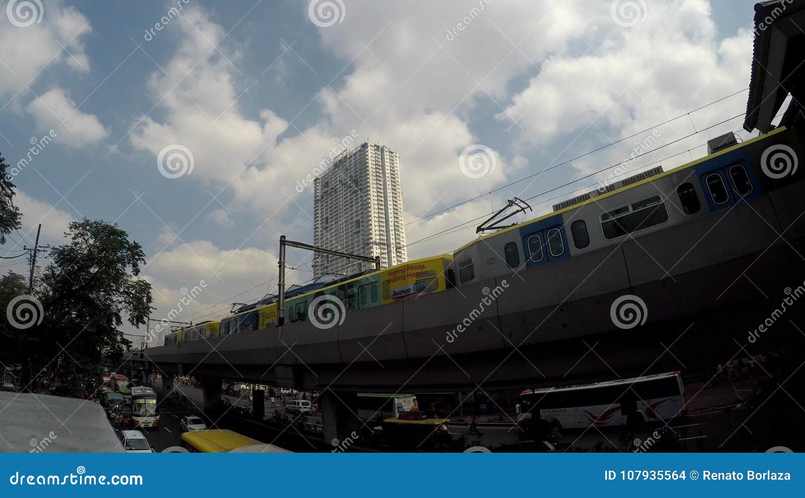 Light Railway Train Passing on Elevated Rail Track Over Congested ...