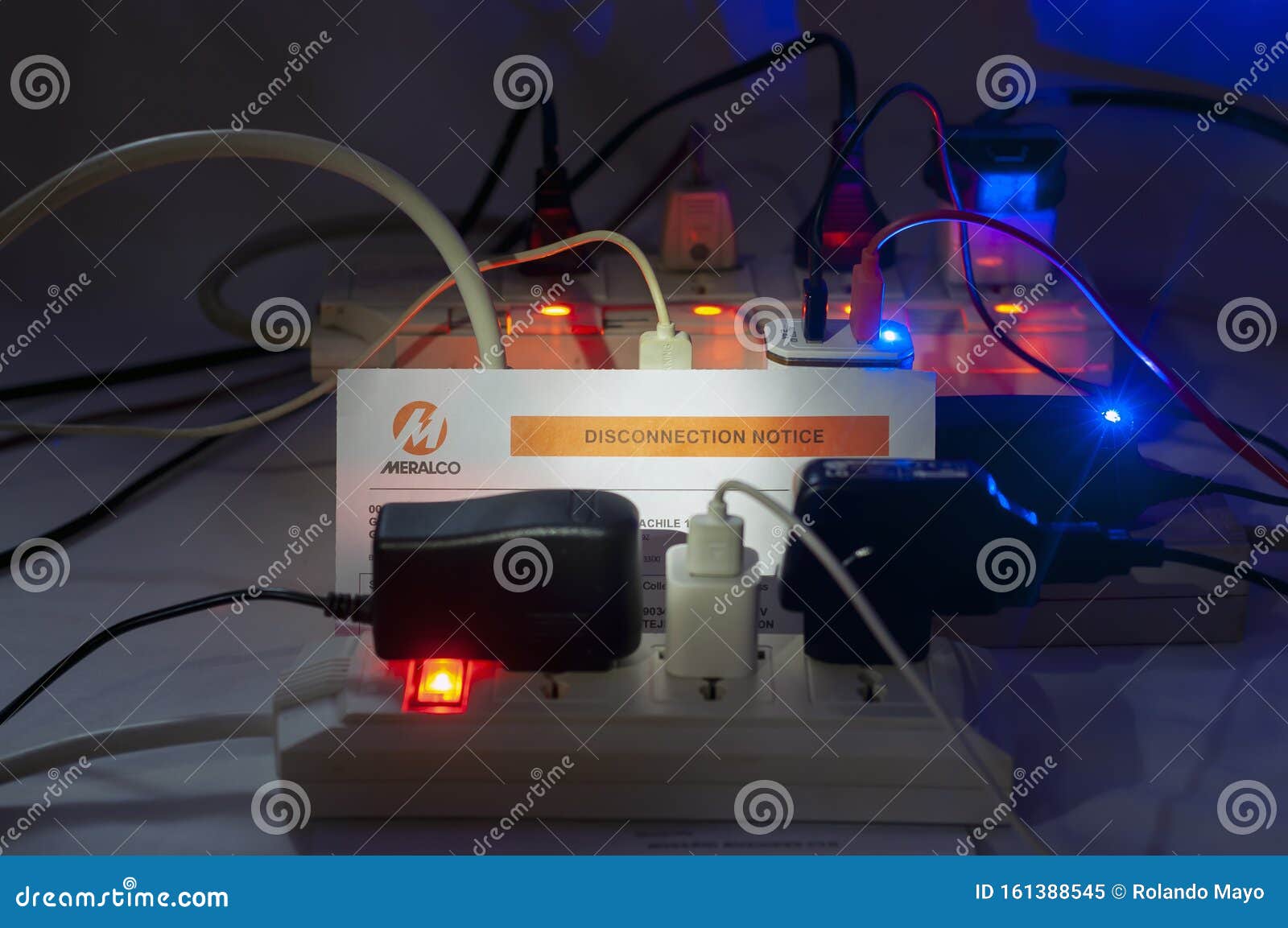 Low Key Night Shot of Multiple Overloaded Power Boards Extension Socket ...