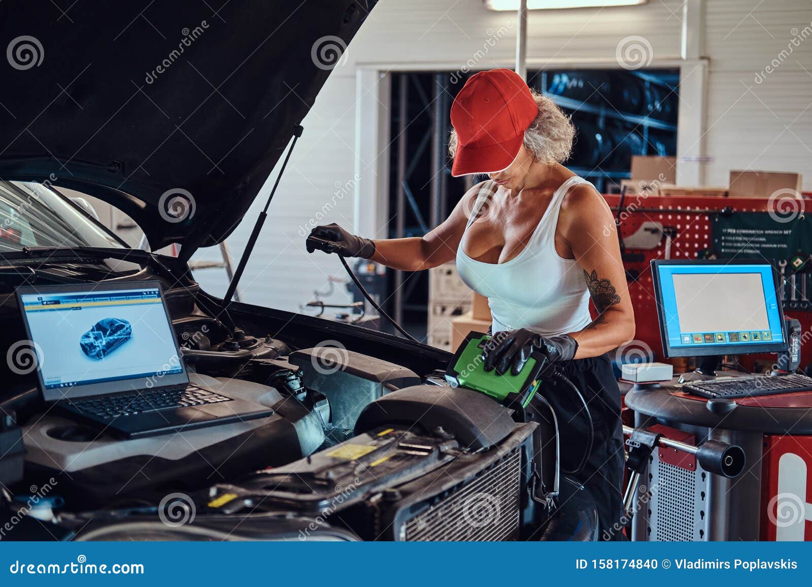 Professional Female Worker is Fixing Car Stock Photo - Image of indoors ...