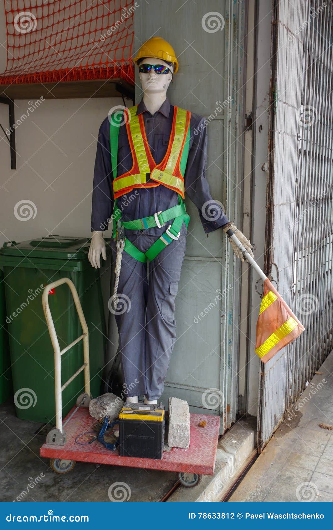 Mannequins of a Worker Outside with Wheelbarrow and Car Battery in ...