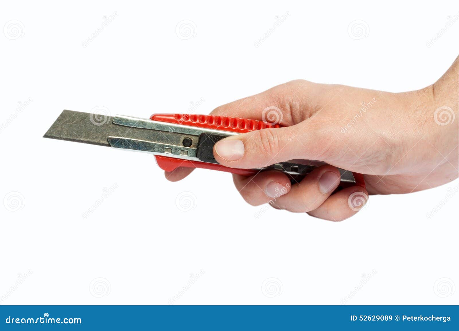 Mano con el cortador imagen de archivo. Imagen de talle - 52629089