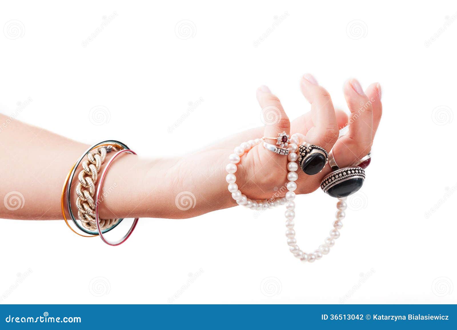 Mano con joyería foto de archivo. Imagen de pulseras - 36513042