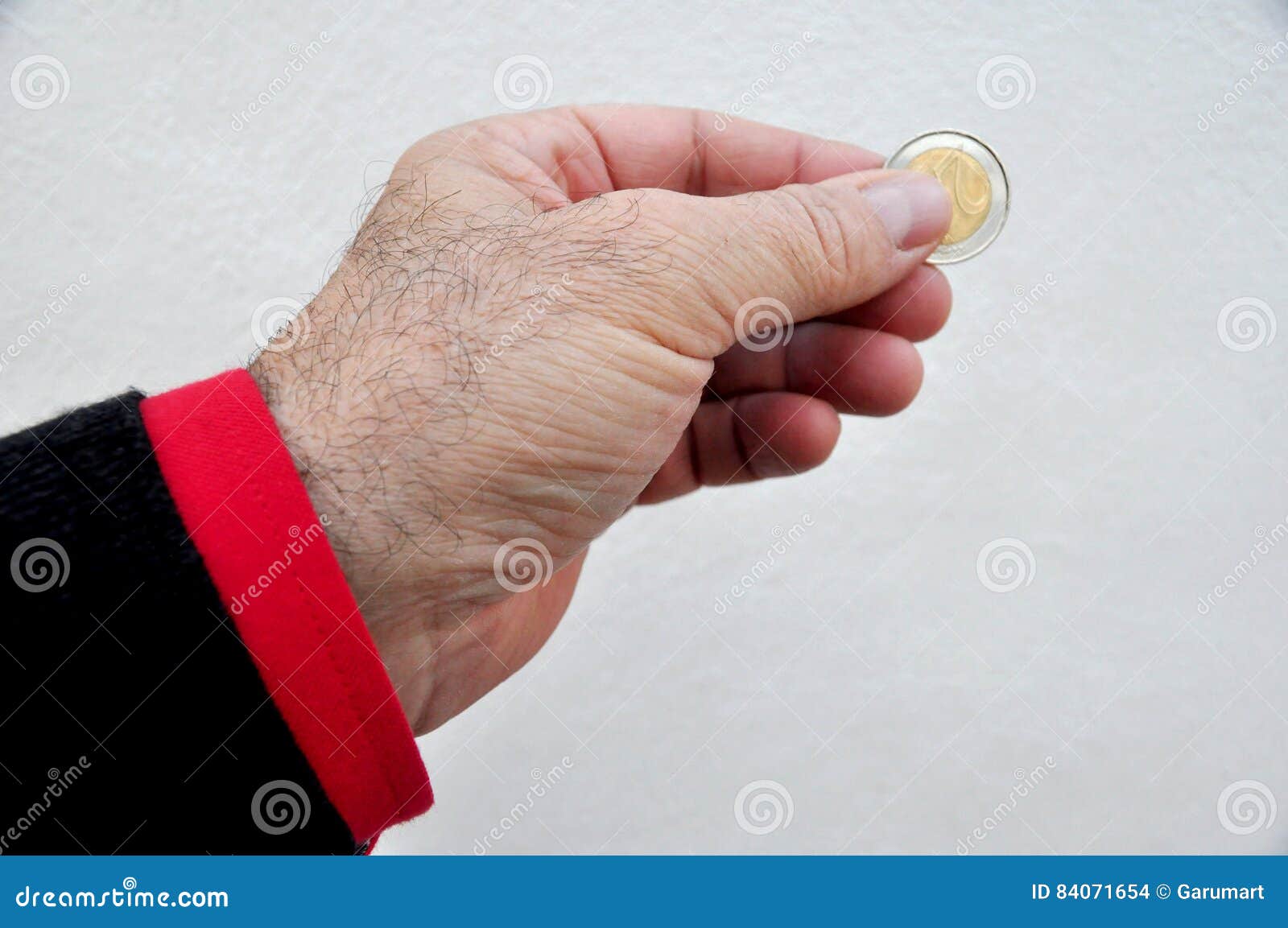 Mano con la moneda foto de archivo. Imagen de divisa - 84071654