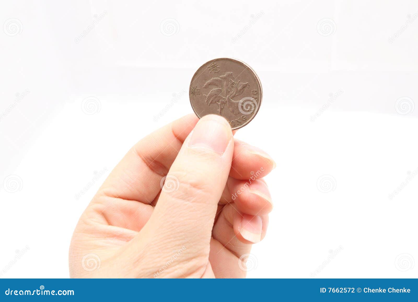 Mano con una moneda foto de archivo. Imagen de intercambio - 7662572