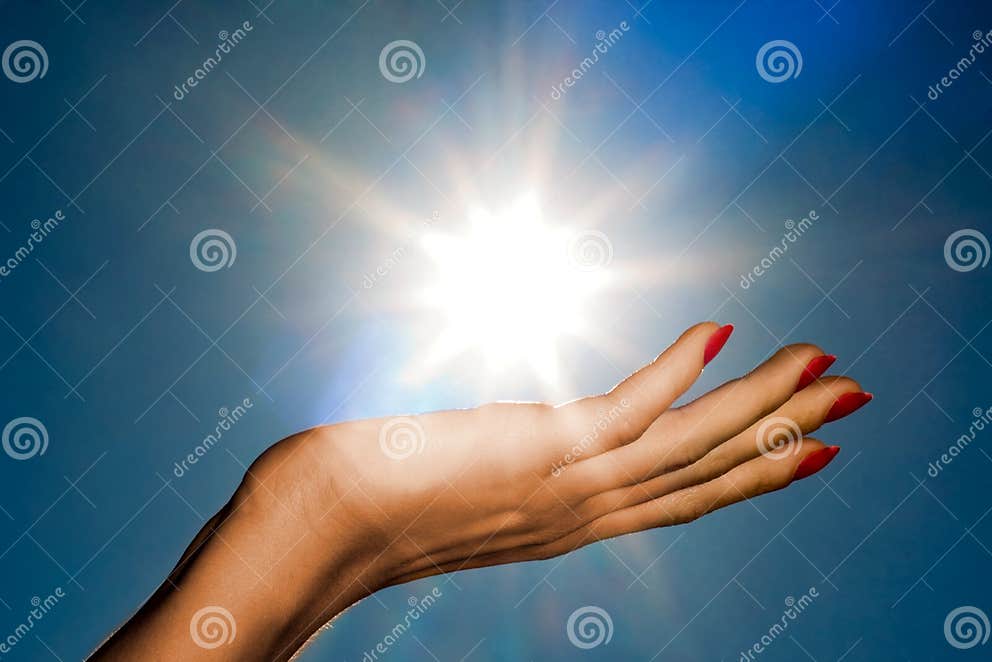 Mano y sol imagen de archivo. Imagen de rojo, gradiente - 12001059
