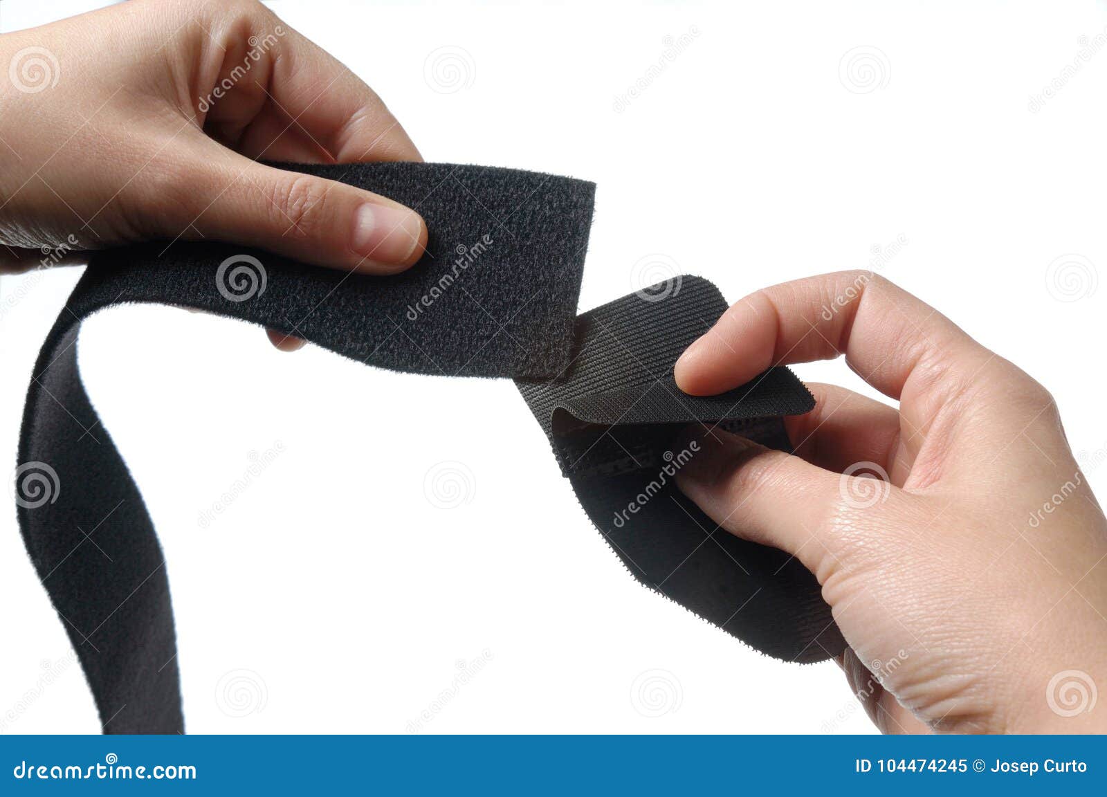 Mano y velcro del detalle imagen de archivo. Imagen de color - 104474245