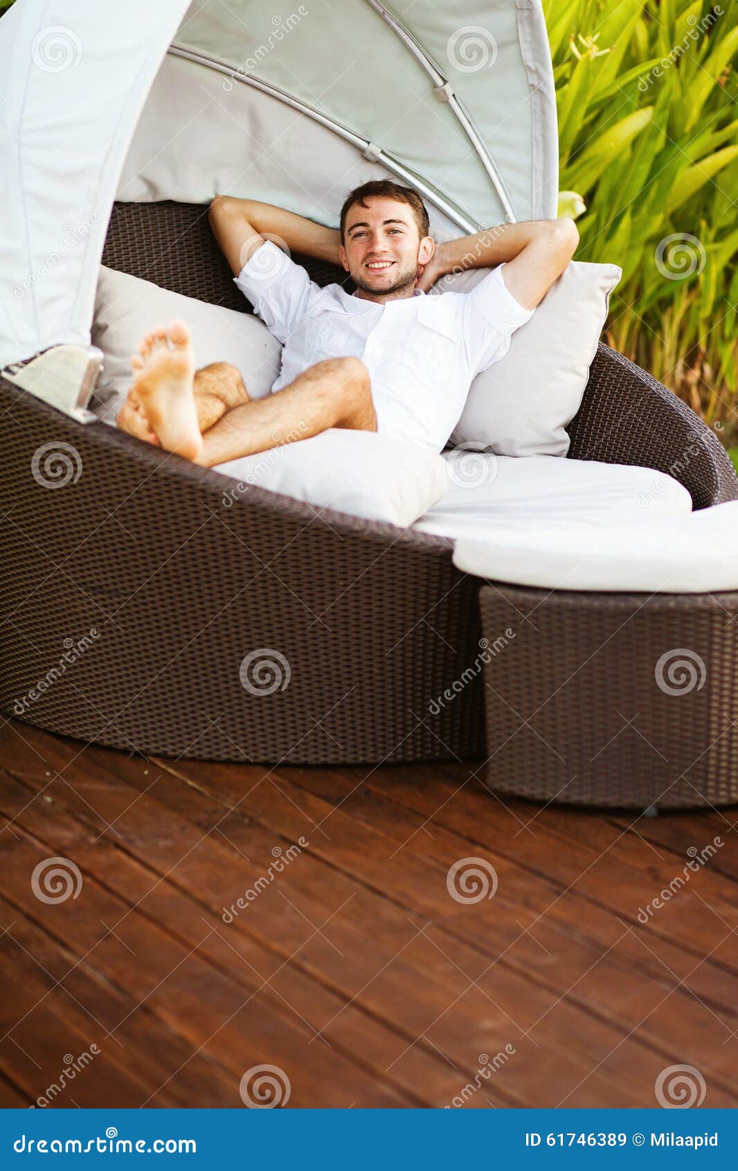 Manrelaxing at resort stock image. Image of adult, people - 61746389