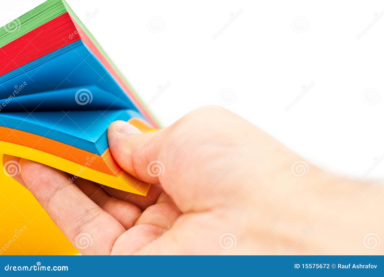 Mans Hand and Colored Paper Stock Photo - Image of cross, bright: 15575672