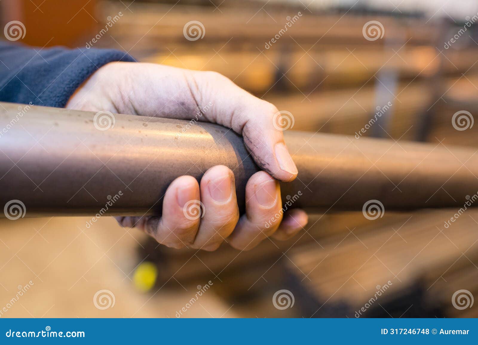 Mans Hand Holding Metal Pole Stock Photo - Image of company, metal ...