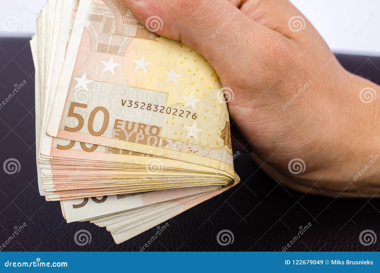 Mans Hand Holding Several 50 Euro Banknotes Stock Image - Image of ...