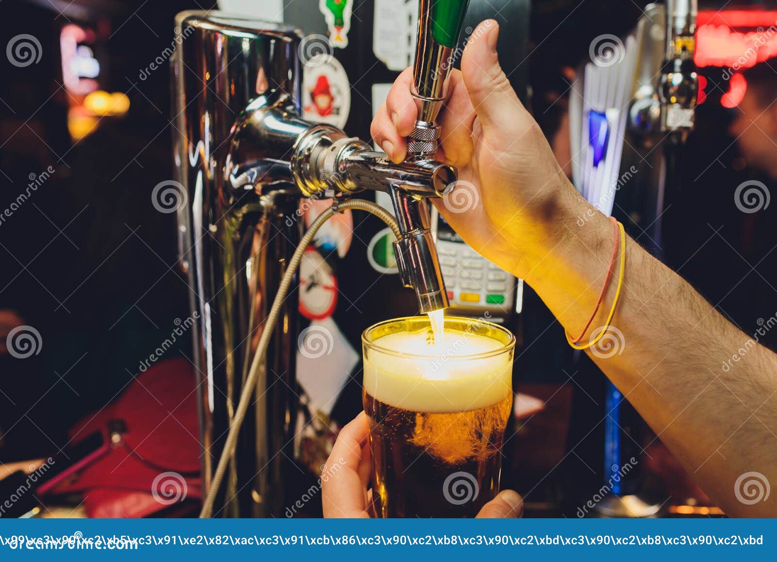 Mans Hand Pouring Pint of Beer Behind the Bar. Stock Image - Image of ...
