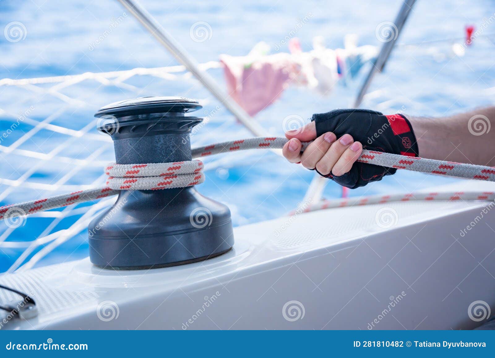 Mans Hand Pulling Winch Rope on Sailing Boat Stock Photo - Image of ...