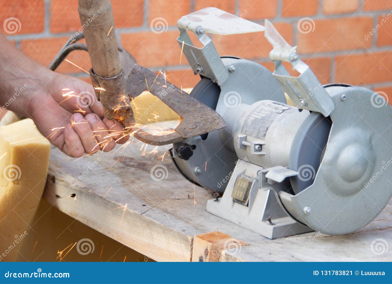 Mans Hand Sharpens a Hoe on Electric Grindstone in Rural Shed Stock ...