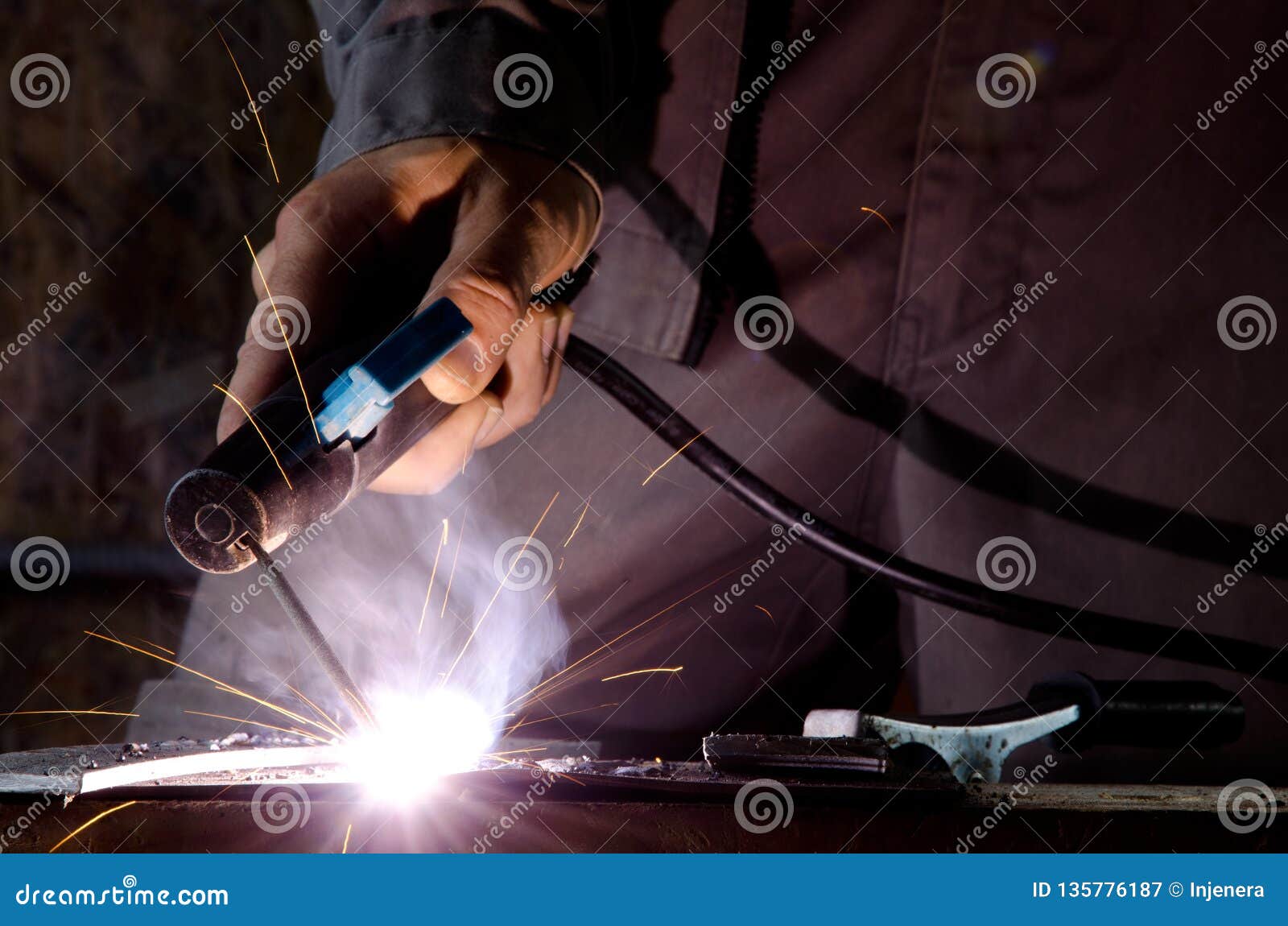 Mans Hand with Welding Machine Stock Image - Image of bright, steel ...